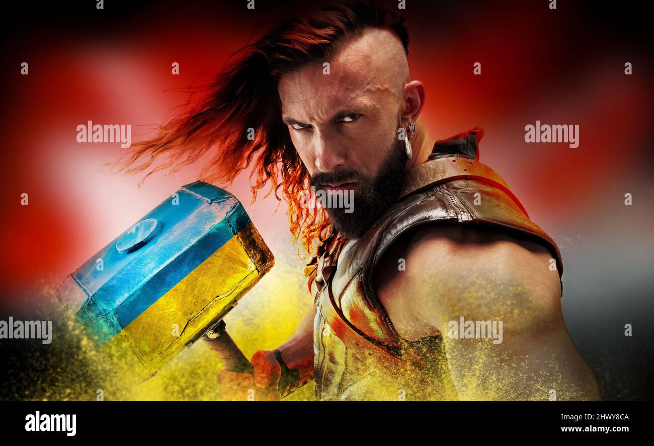Portrait of brave, courage man, warrior with huge hammer painted in ...