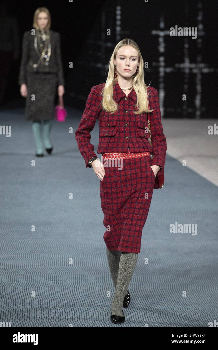 A model walks the runway during the Chanel Womenswear Fall/Winter 2022 ... A model walks the runway during the Chanel Womenswear Fall/Winter 2022 ...