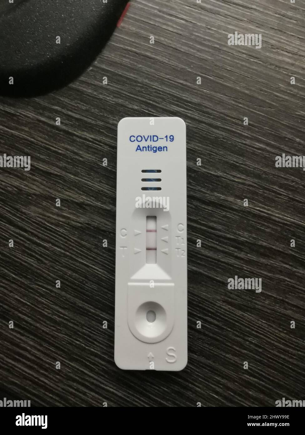 a positive covid-19 test on the counter Stock Photo - Alamy