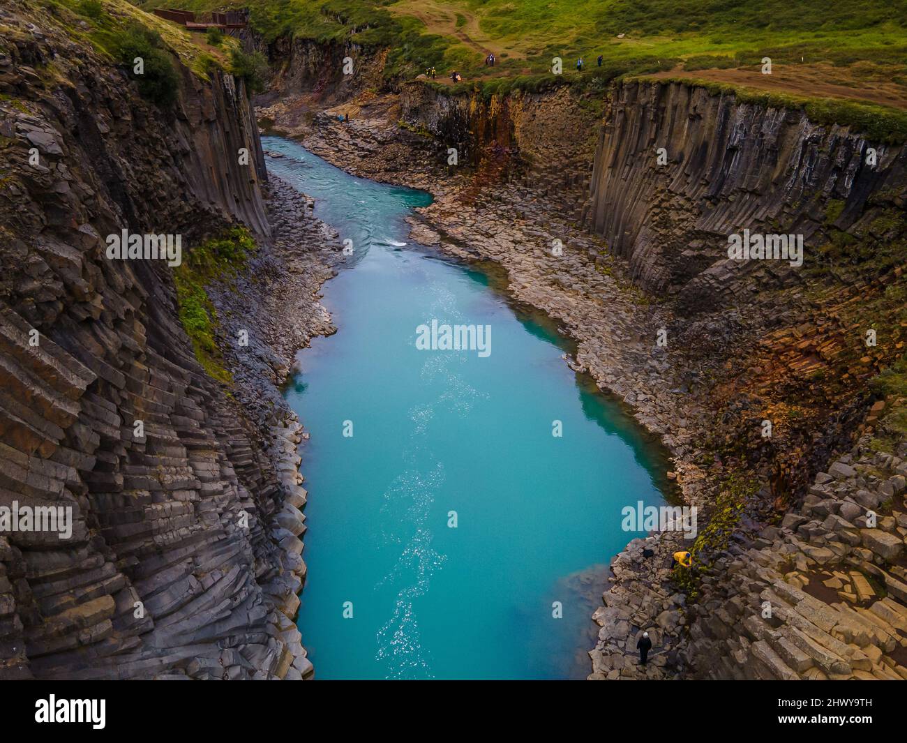 Beautiful aerial view of the studlagil canyon, and the largest number of basalt rock columns in ...