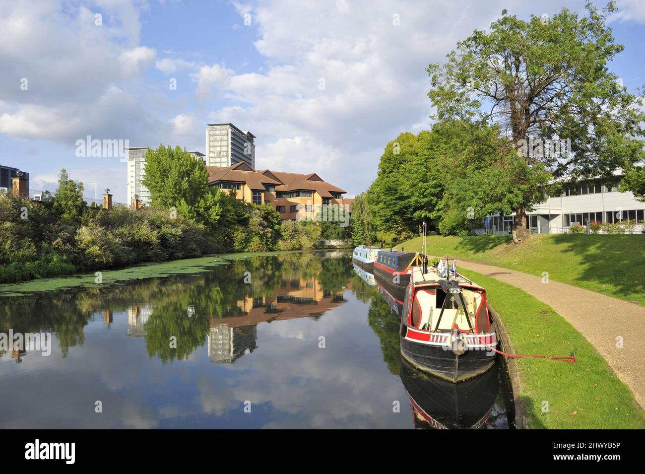 Grand Union Canal walk, boats on river Brent in Brentford west London ...