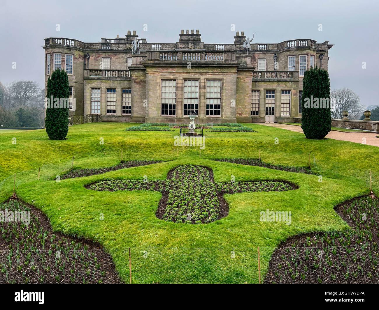 Ornamental garden and the eastern aspect of Lyme Hall in Lyme Park near ...