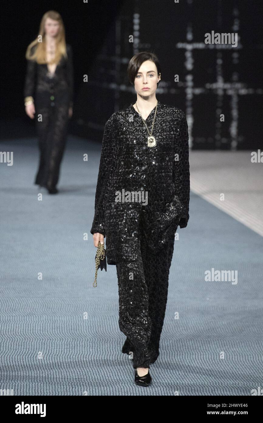 A model walks the runway during the Chanel Womenswear Fall/Winter 2022-2023 show as part of ...