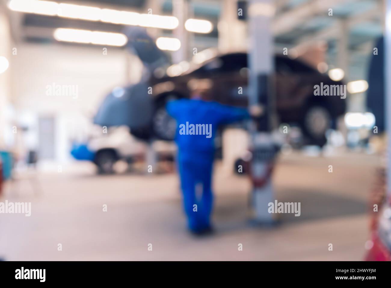 Blurred no focus background repair car service auto on lift Stock Photo ...