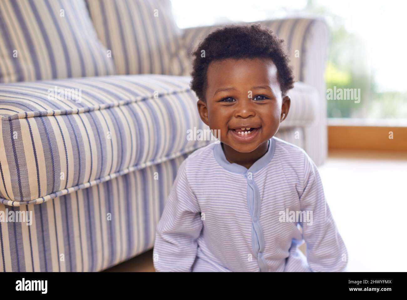 Baby at home. Shot of an adorable little baby boy at home Stock Photo ...