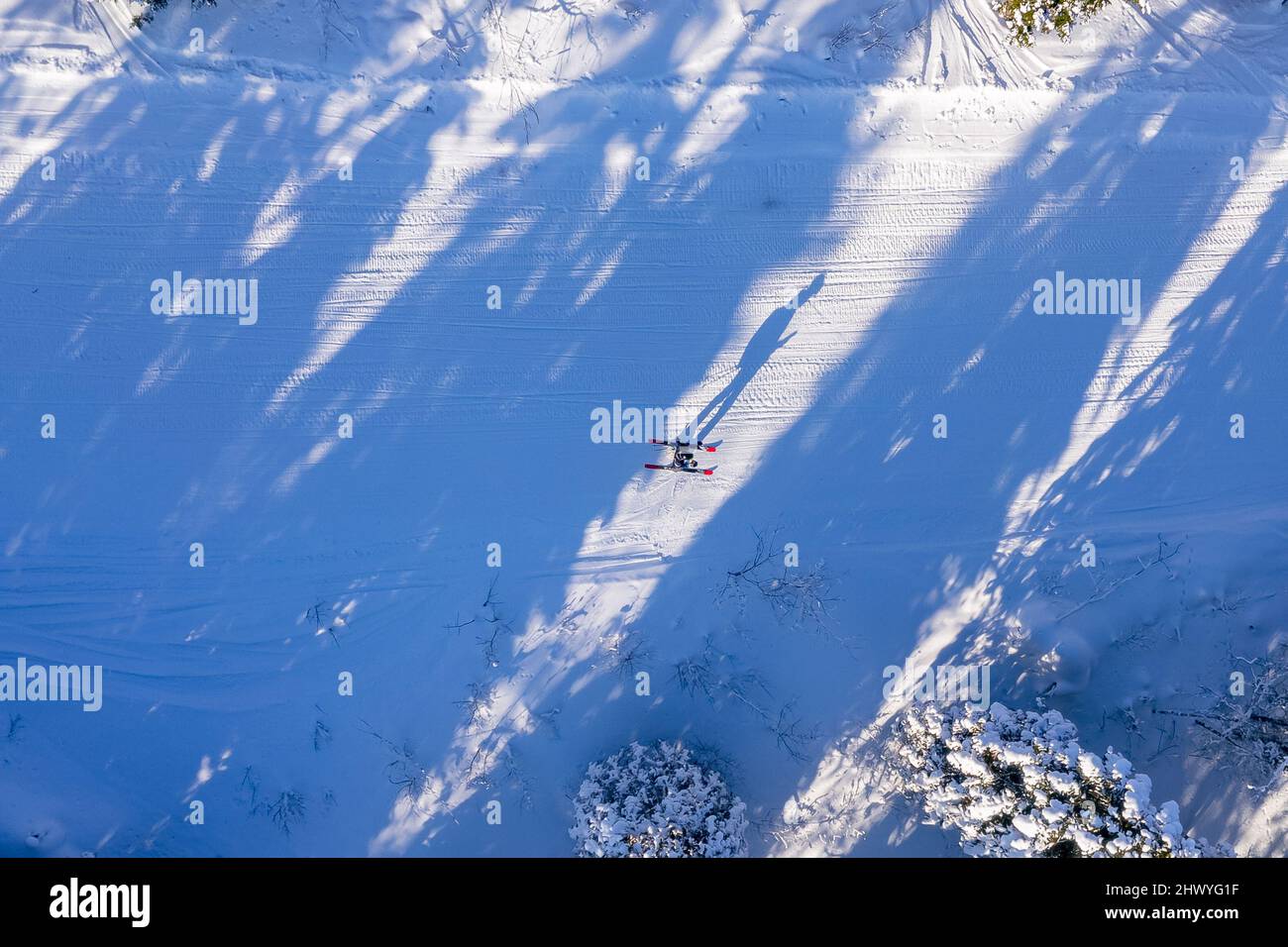 Skier riding through winter hi-res stock photography and images - Alamy