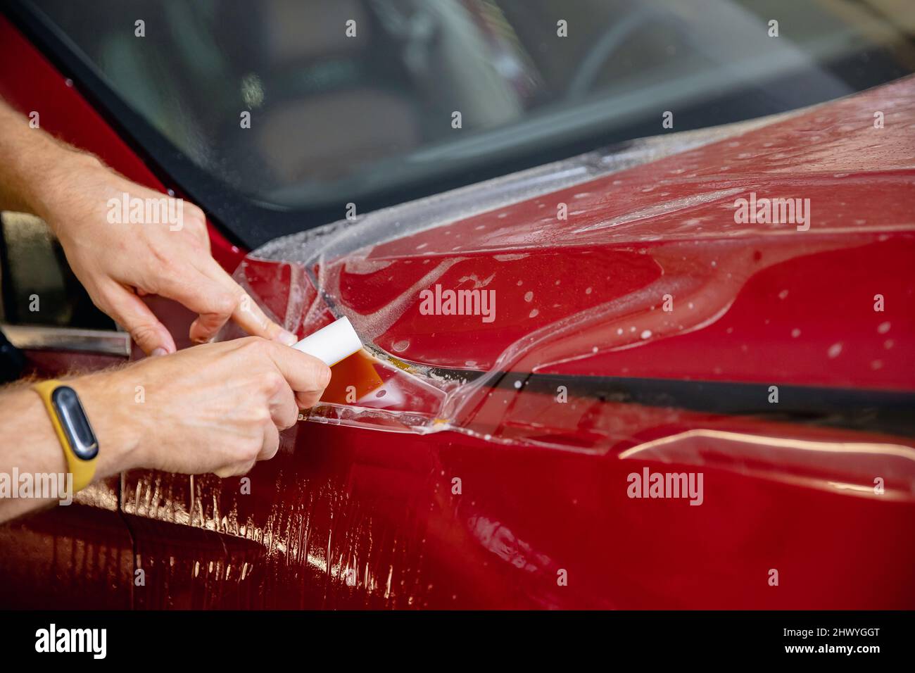 Concept transparent protection for car paint. Instal protective vinyl ...