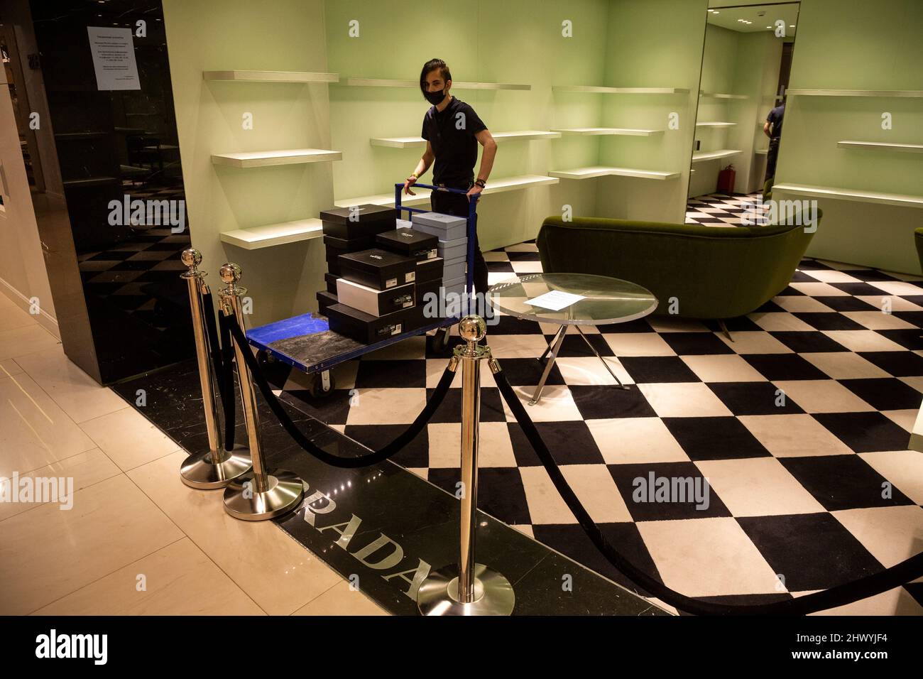 Moscow, Russia. 8th of March, 2022 A store employee takes out the ...