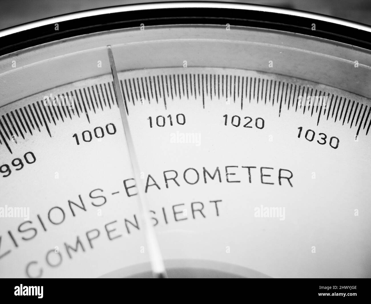 Close-up view of the scale with pointer of an analogue barometer ...