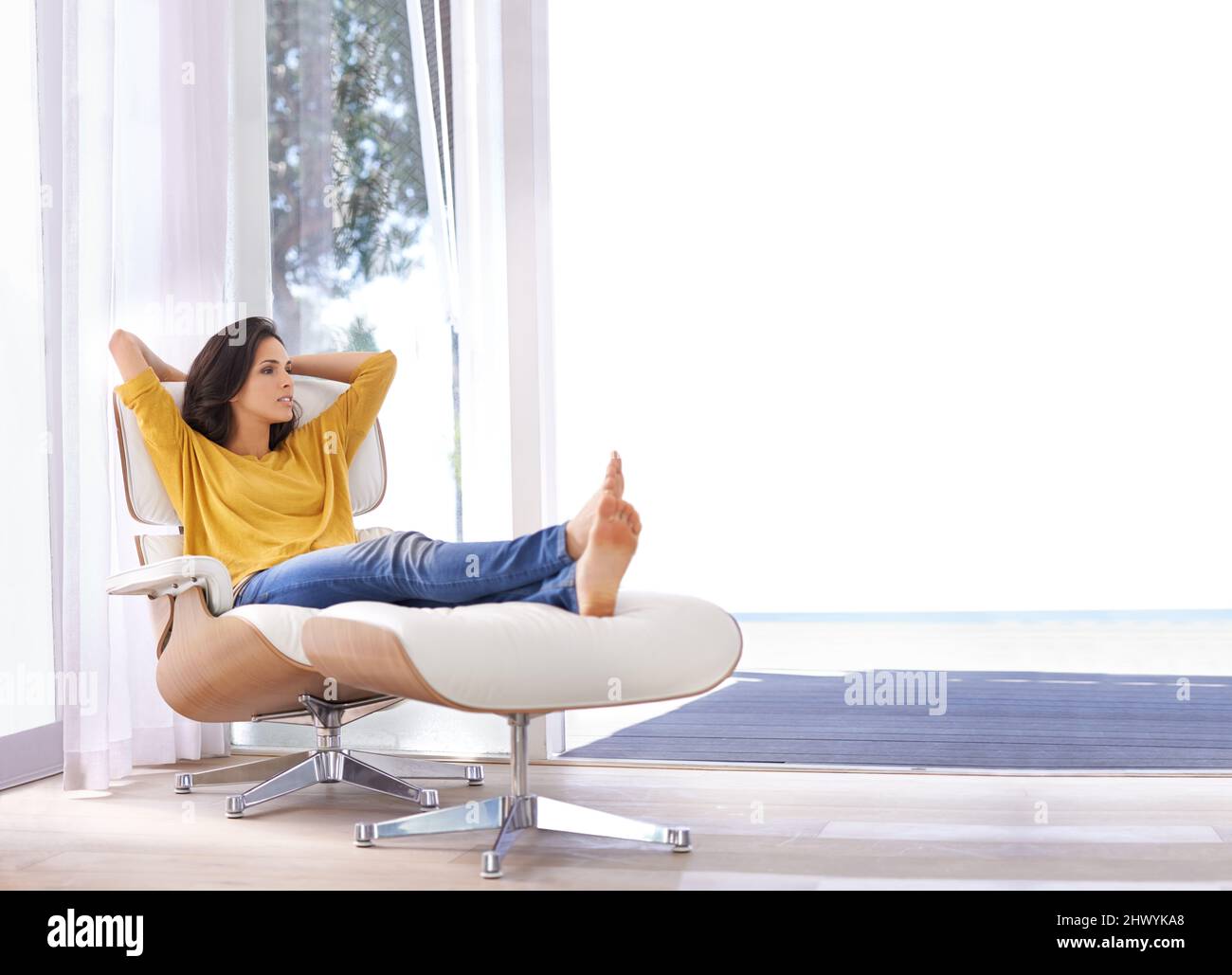 Crossed legs on chair hi-res stock photography and images - Alamy