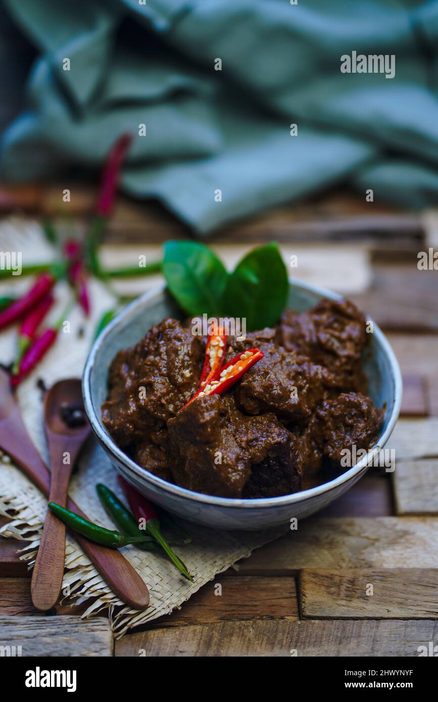 Indonesian Famous Food Beef Rendang with fresh chili Stock Photo - Alamy