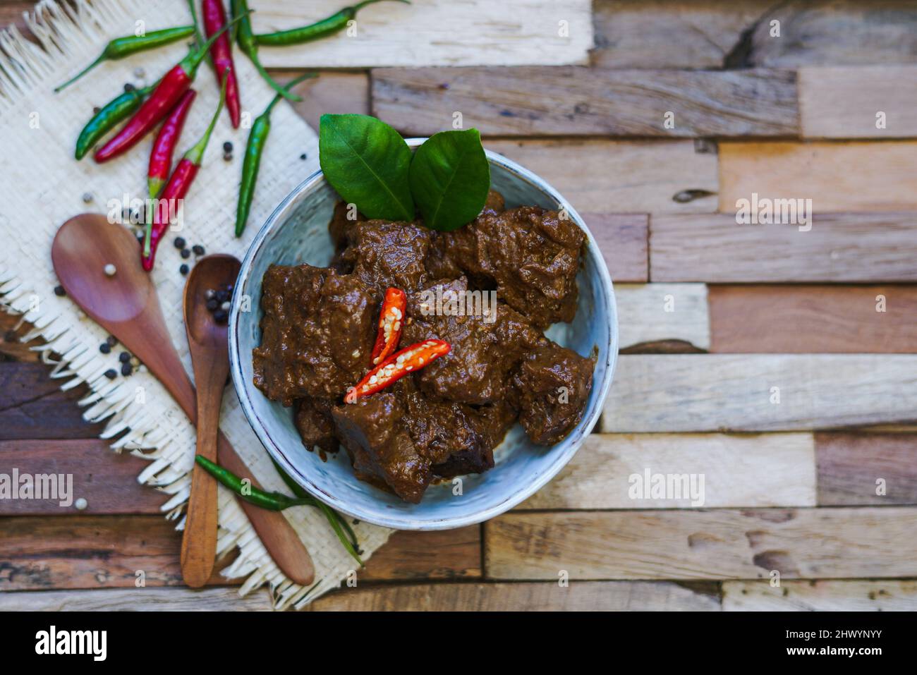 Indonesian Famous Food Beef Rendang with fresh chili Stock Photo - Alamy