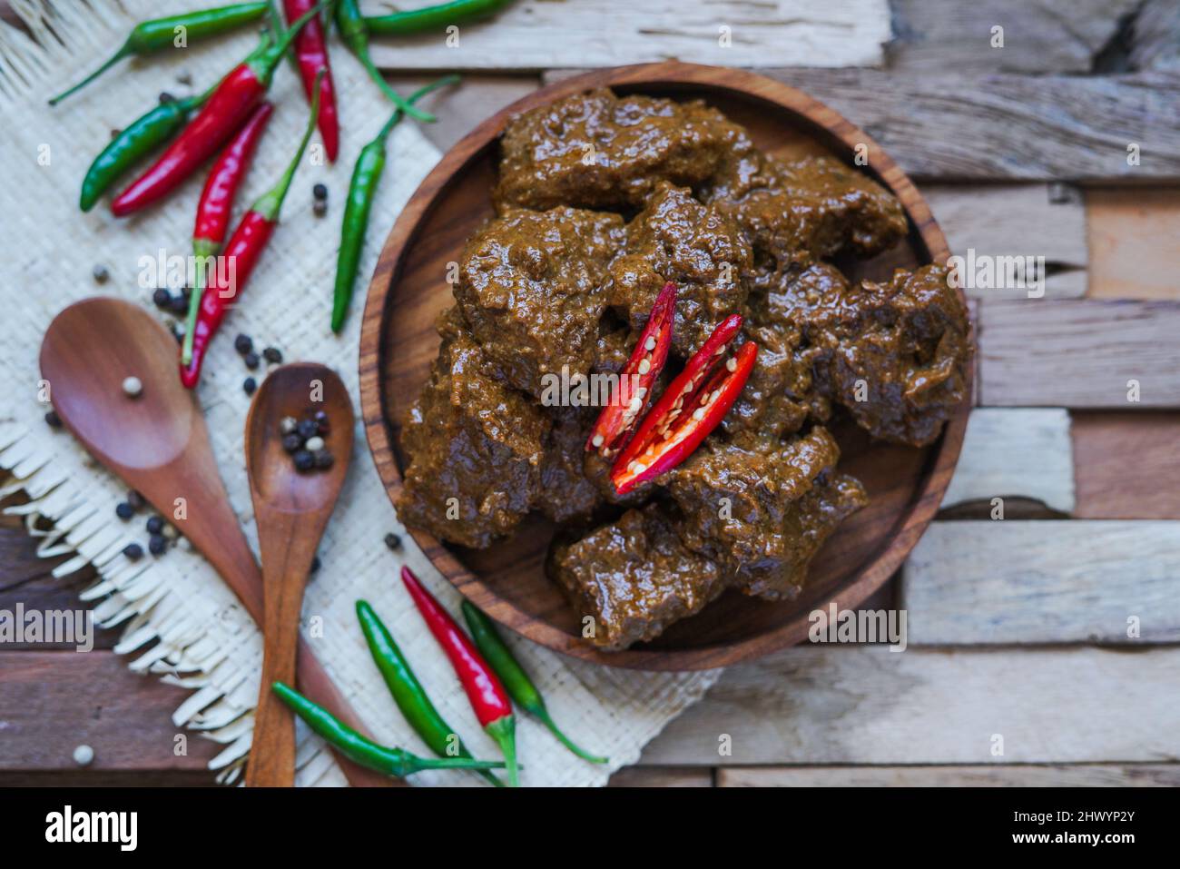 Indonesian Famous Food Beef Rendang with fresh chili Stock Photo - Alamy