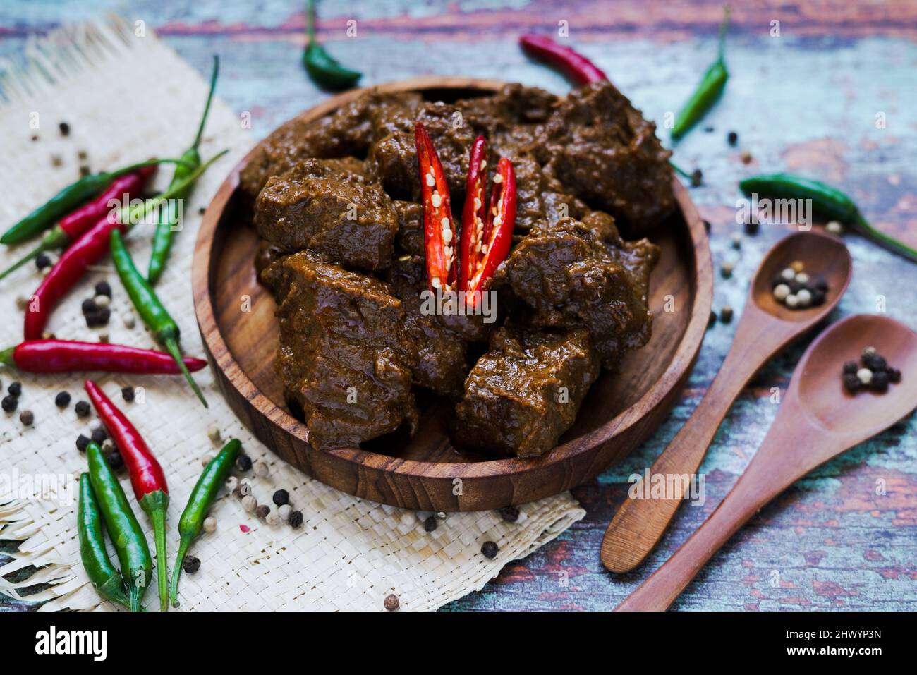 Indonesian Famous Food Beef Rendang with fresh chili Stock Photo - Alamy