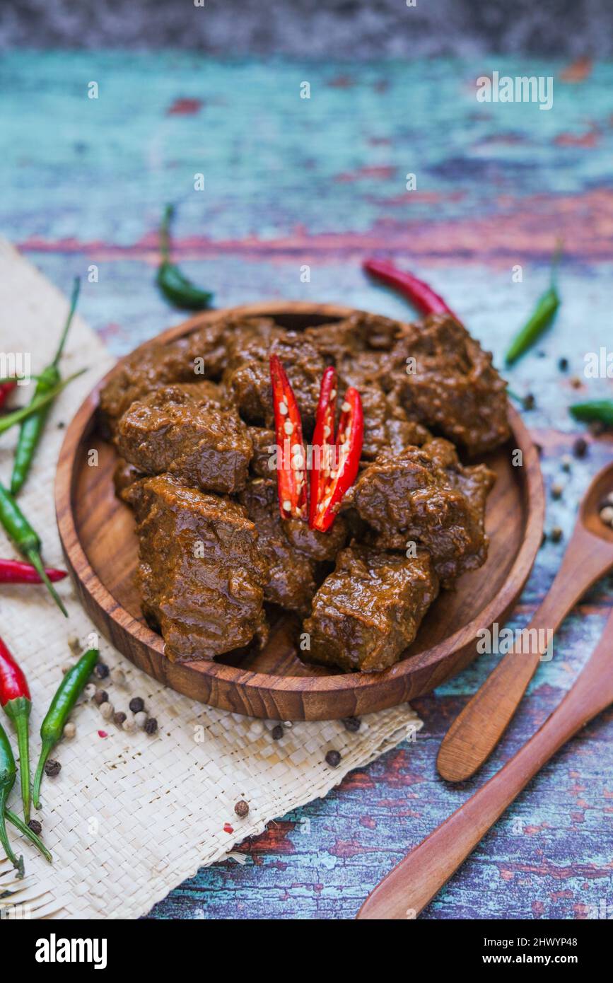 Indonesian Famous Food Beef Rendang with fresh chili Stock Photo - Alamy