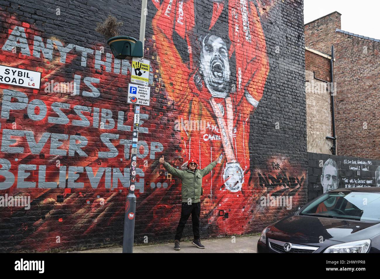 Fans check out the mural on Sybil Road near Anfield Stock Photo - Alamy