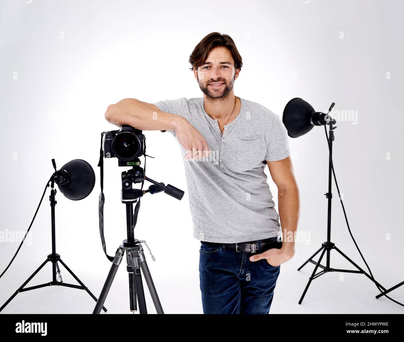 Tools of the photography trade. A professional photographer with his ...