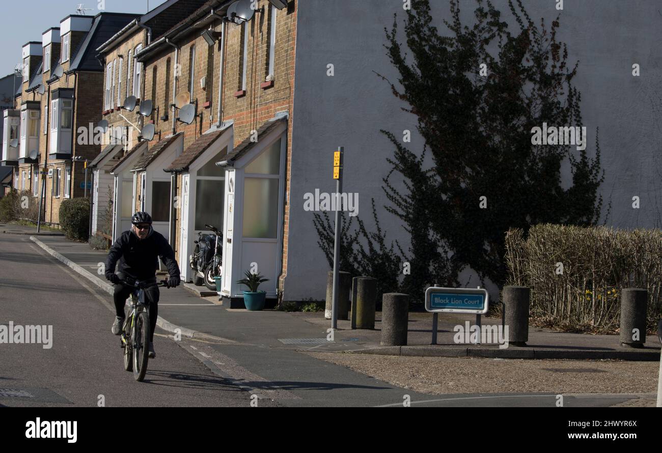 Man Cycling Passed Cottages Market Street Old Harlow Essex Stock Photo ...
