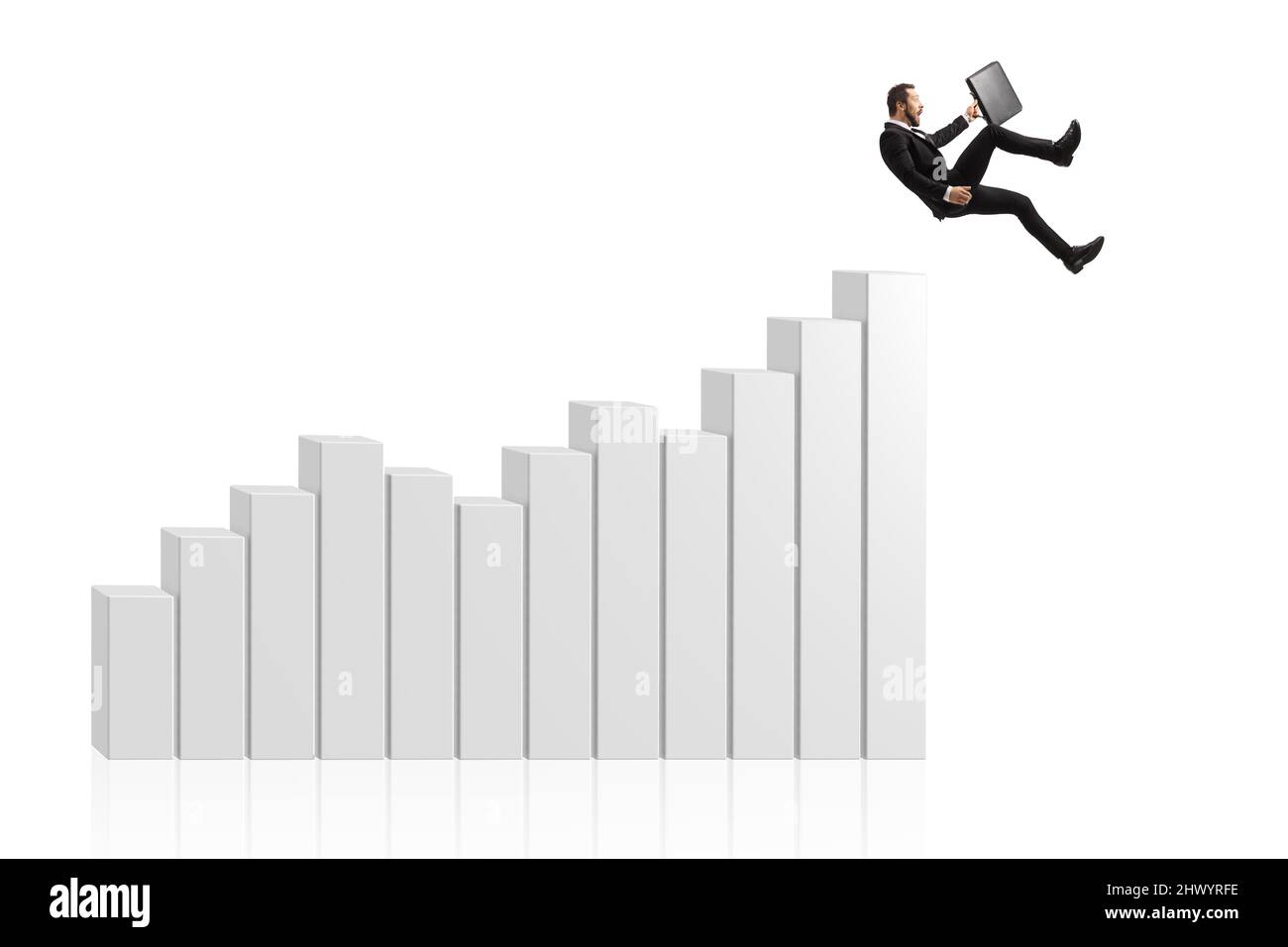 Businessman holding a briefcase and falling from a bar chart diagram ...