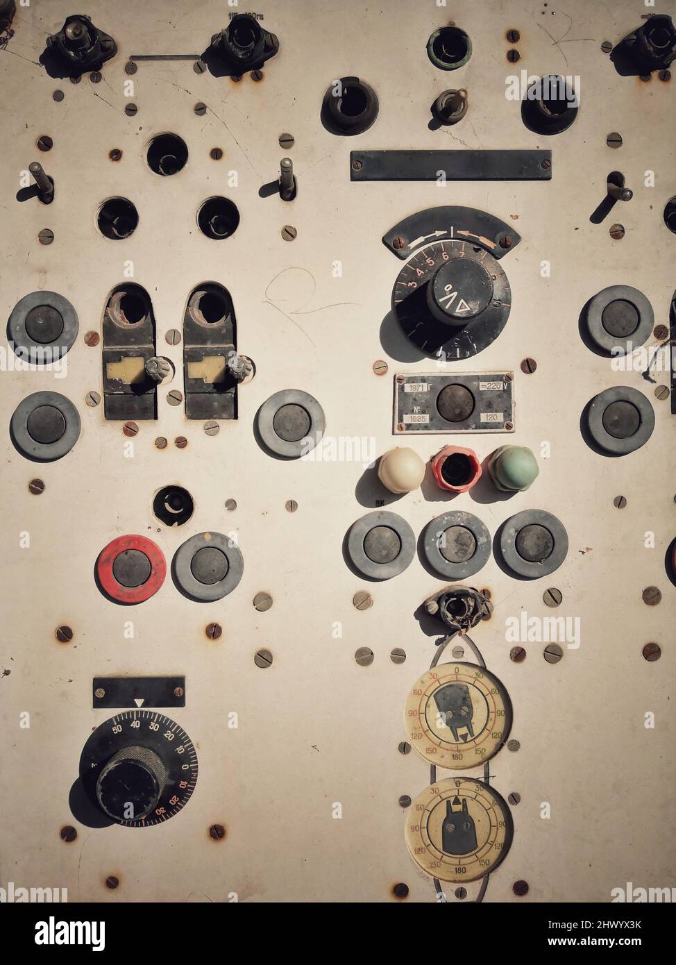 Vintage switch control panel with many buttons in factory manufacturing ...