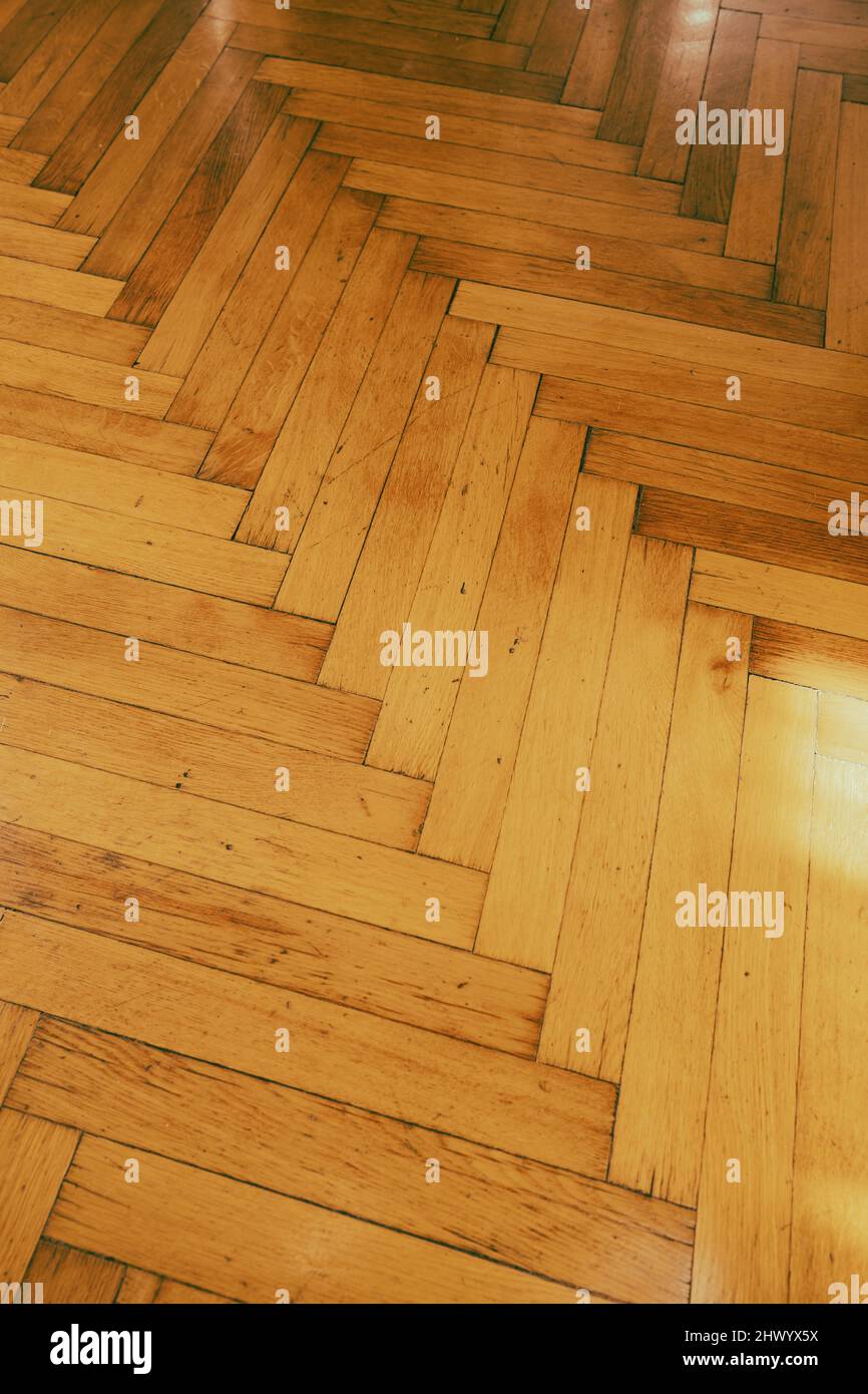 Vintage plain wooden parquet floor detail. Hardwood tiles in a seamless ...
