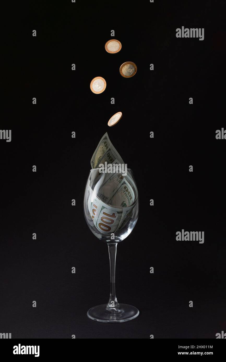 Money Cocktail business concept toast. Dollar banknotes money lies in ...