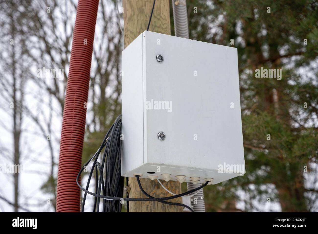 temporary electric cabinet fixed to a post on a construction site ...