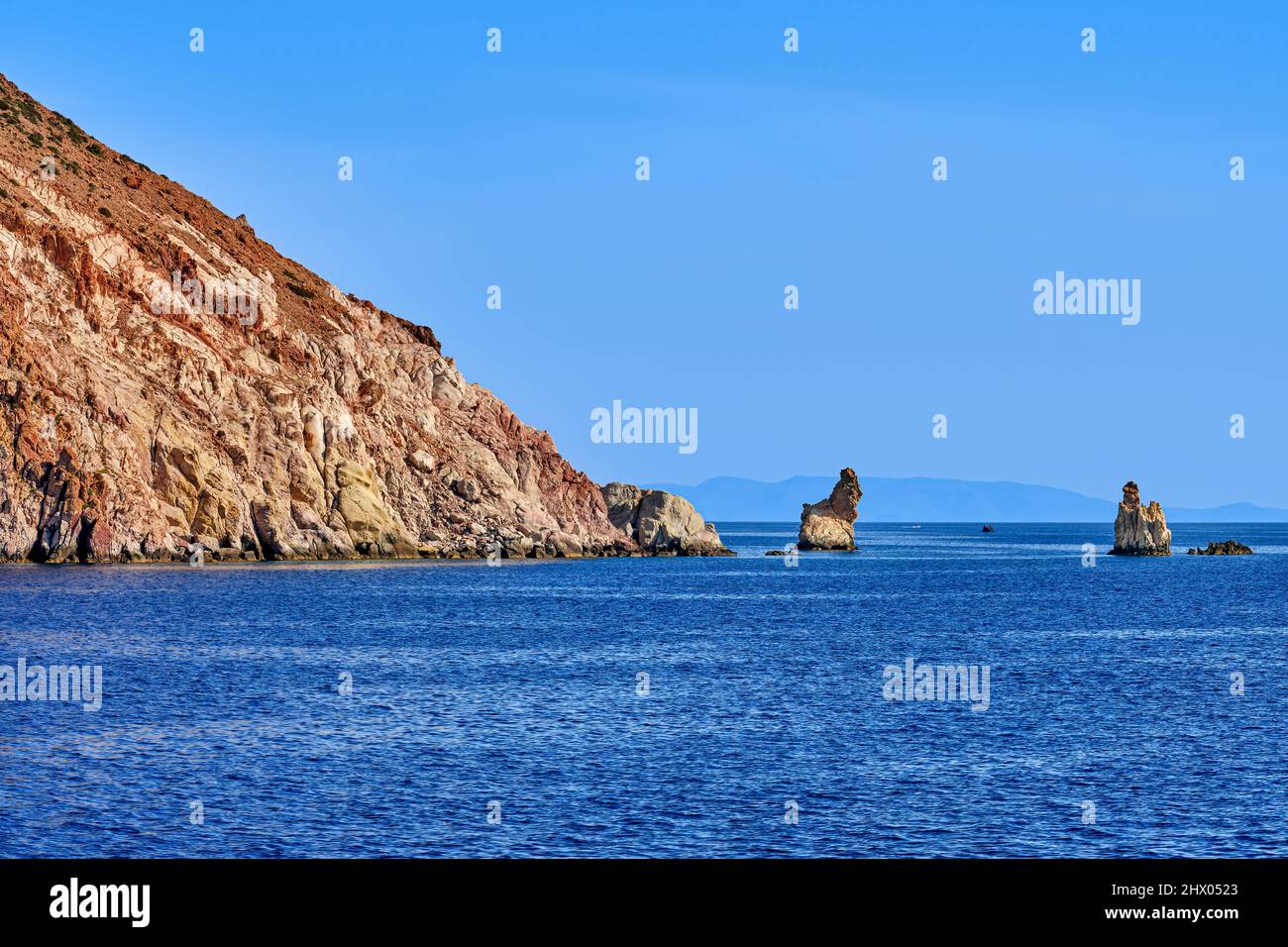 Beautiful view of high hill slope of island in Mediterranean Sea. Blue ...