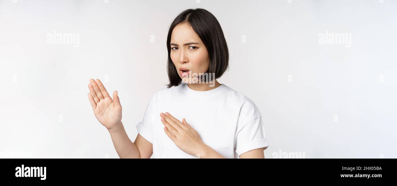 Image of sassy young asian woman standing in karate fighting pose ...