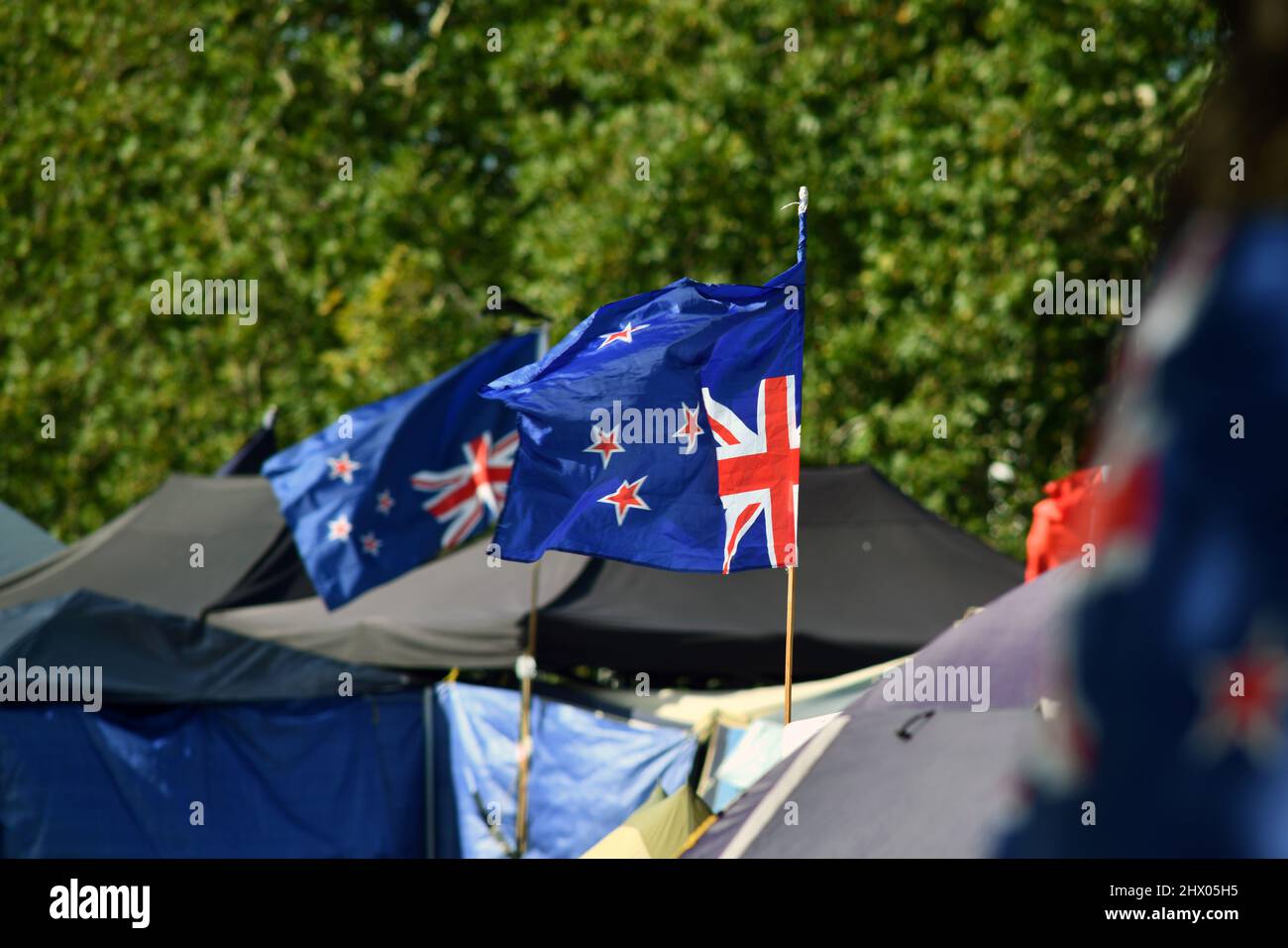 Christchurch, New Zealand, February 22, 2021: Inverted flags fly at the ...