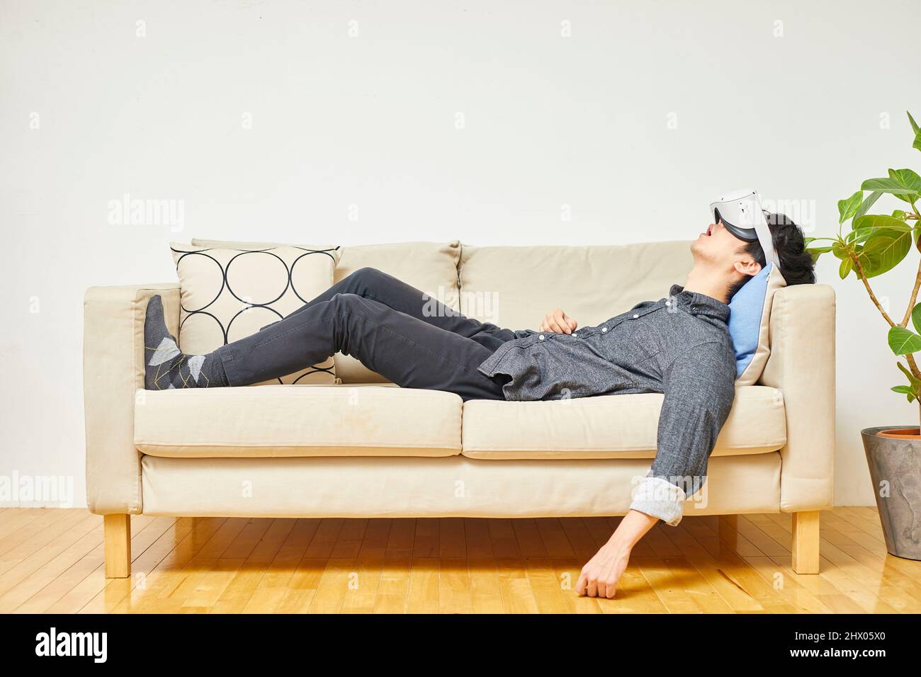 Japanese Man Wearing VR Goggles Stock Photo - Alamy