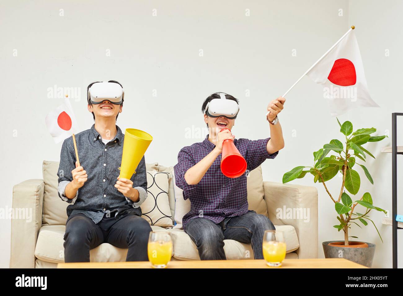 Japanese Men Wearing VR Goggles Stock Photo - Alamy