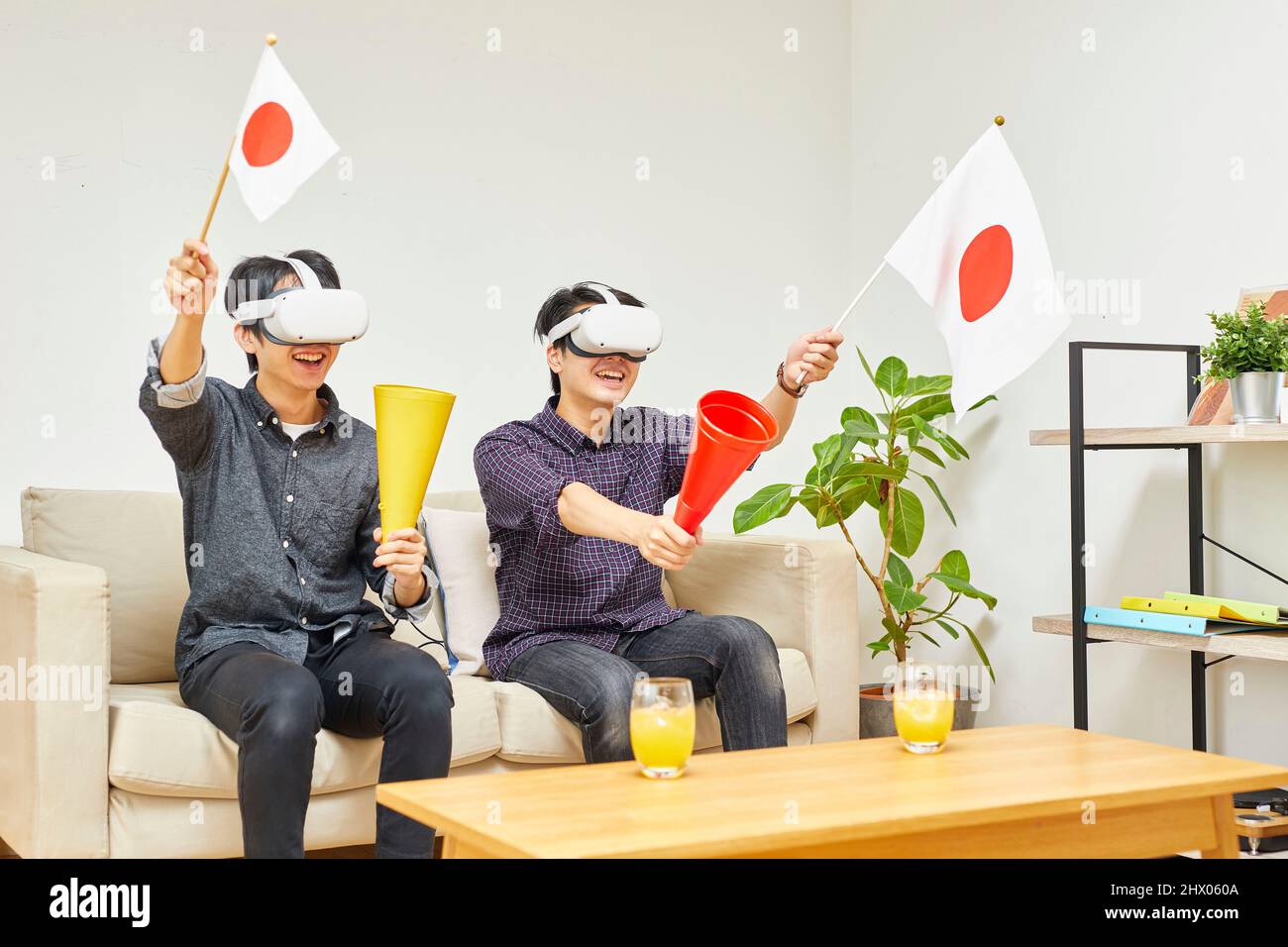 Japanese Men Wearing VR Goggles Stock Photo - Alamy