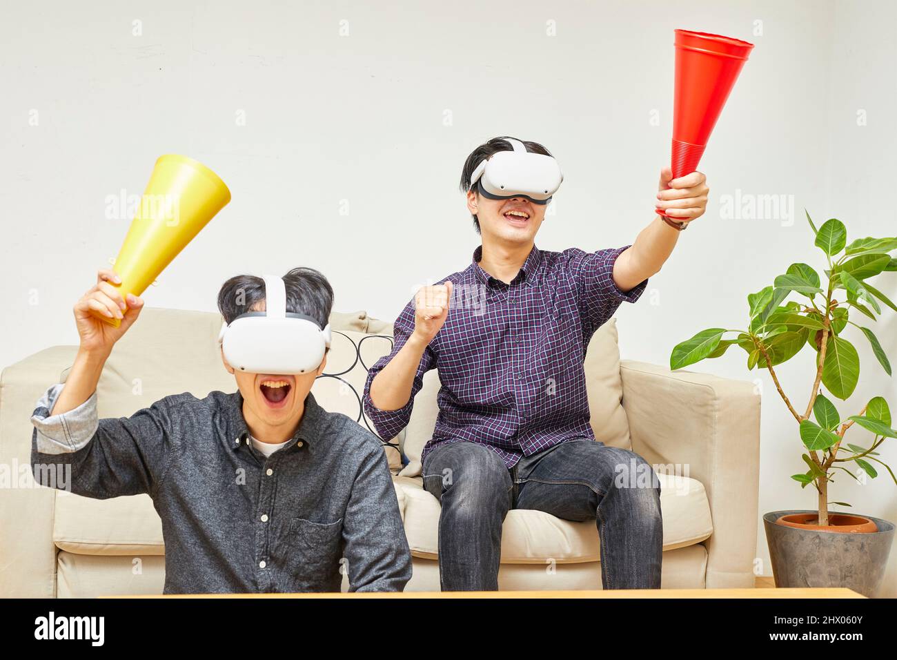 Japanese Men Wearing VR Goggles Stock Photo - Alamy
