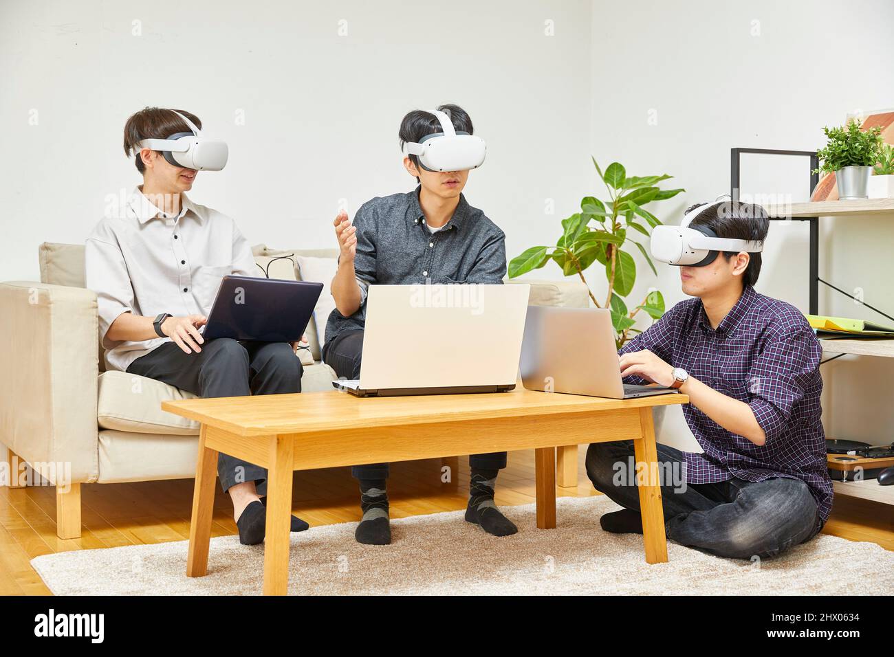 Japanese Men Wearing VR Goggles Stock Photo - Alamy