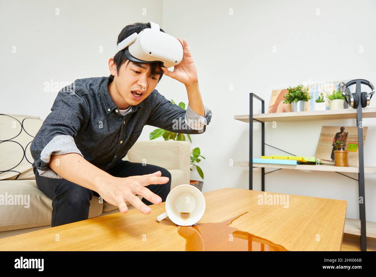 Japanese Man Wearing VR Goggles Stock Photo - Alamy