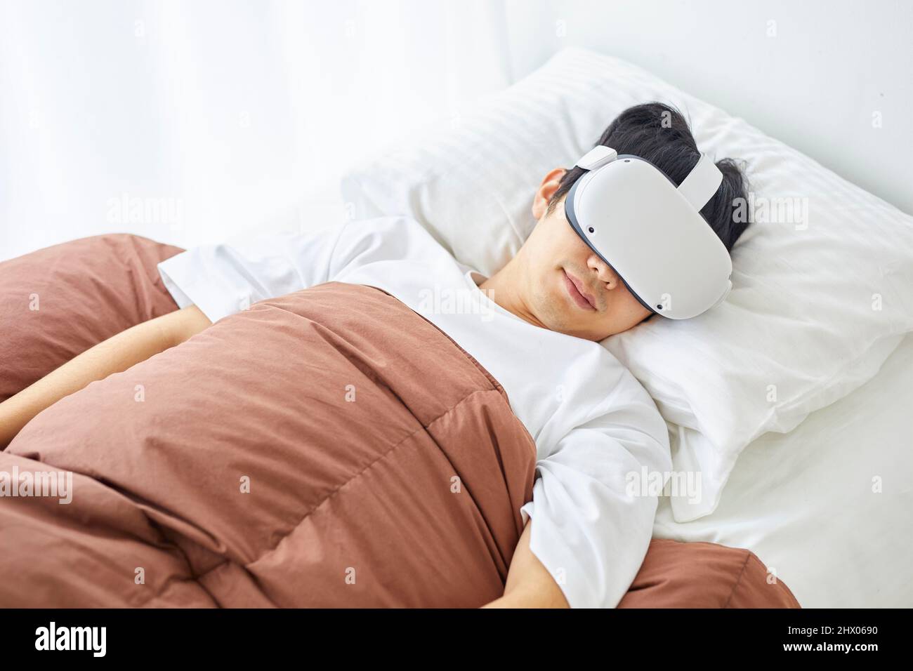 Japanese Man With VR Goggles Stock Photo - Alamy