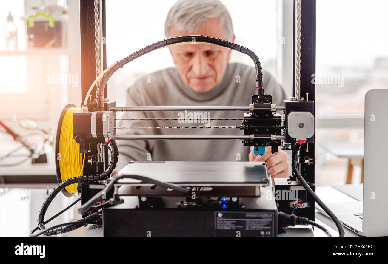 Man with 3D printer Stock Photo - Alamy