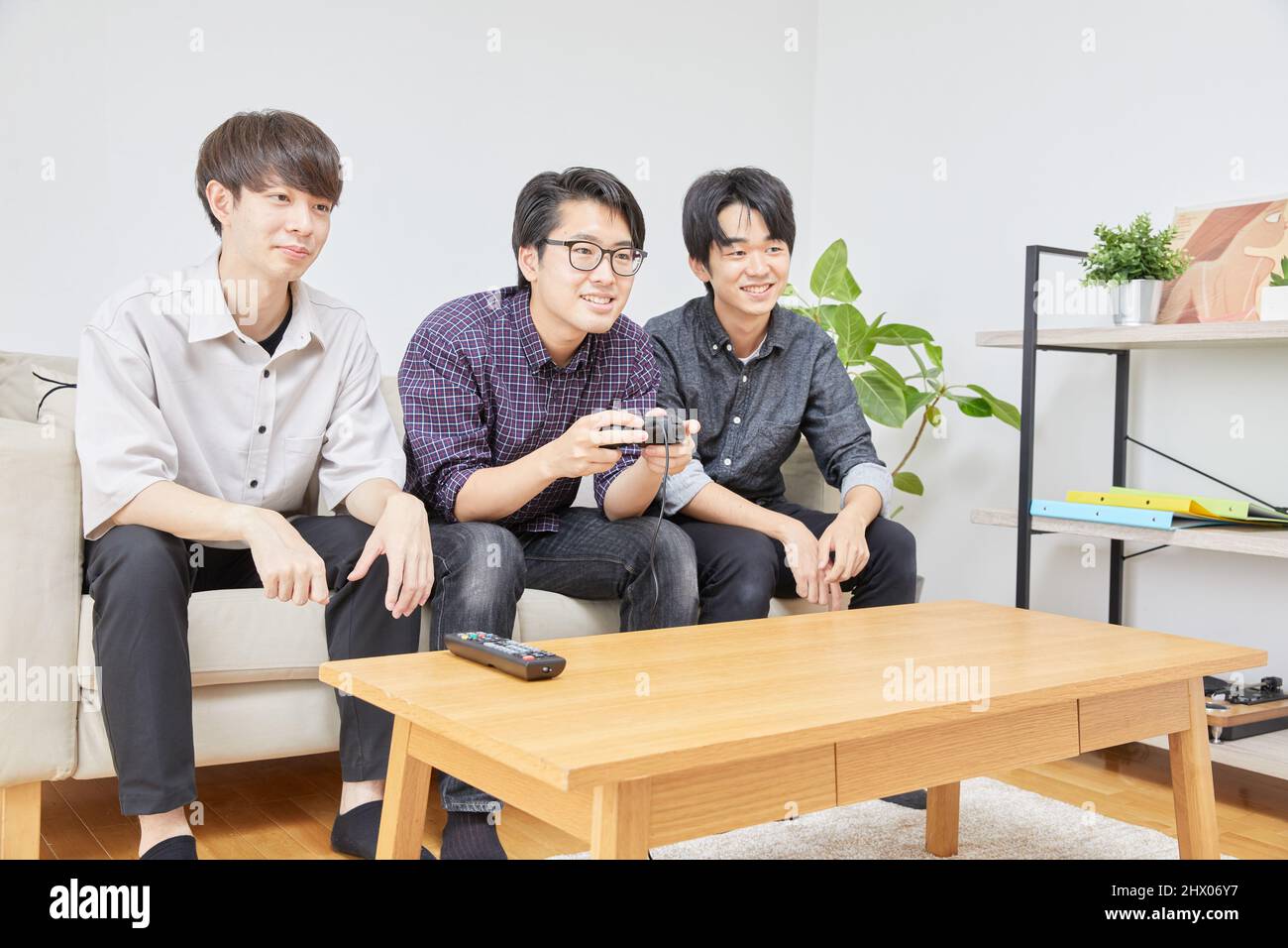 Japanese Men Playing Video Games Stock Photo - Alamy