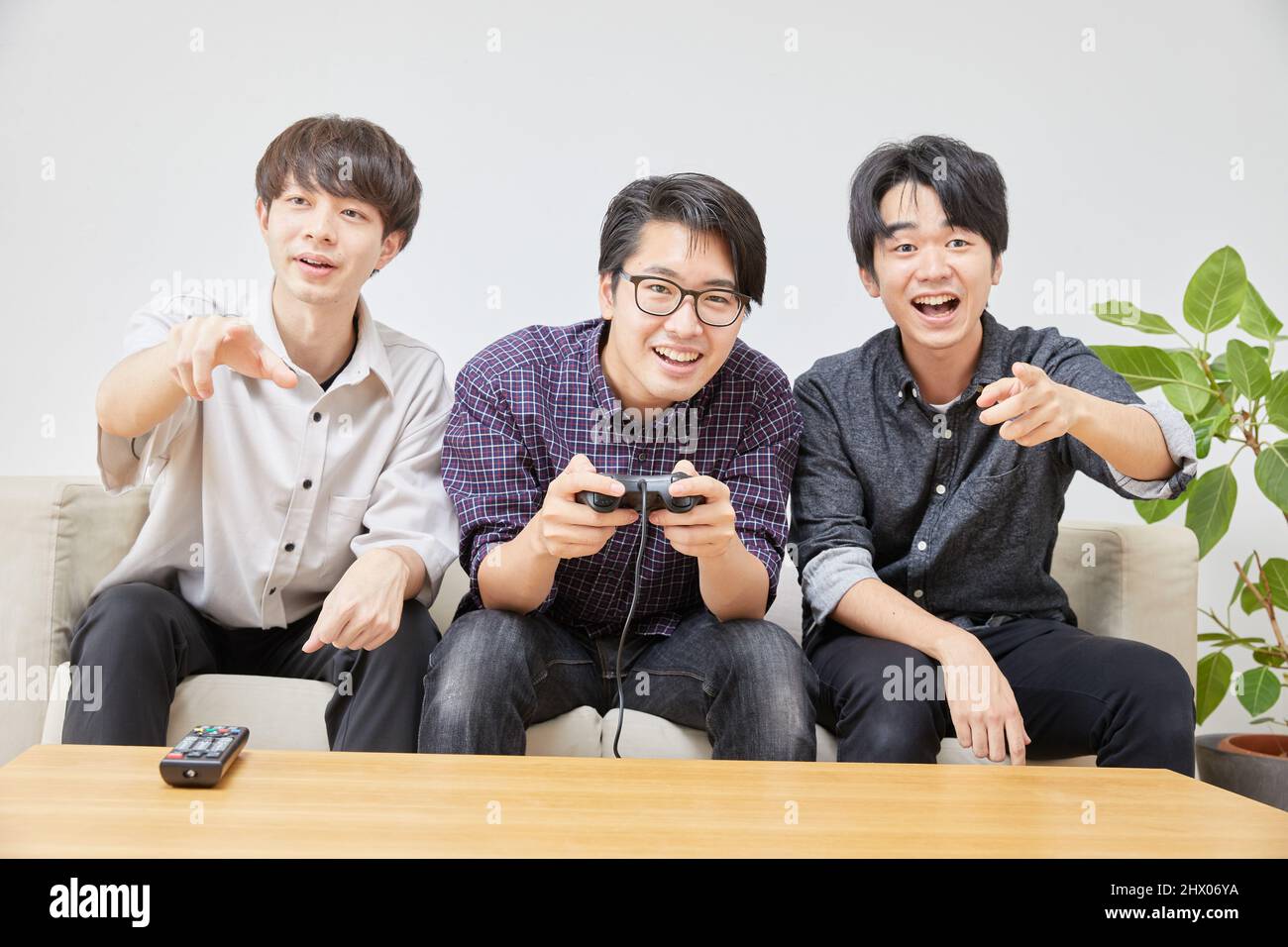 Japanese Men Playing Video Games Stock Photo - Alamy