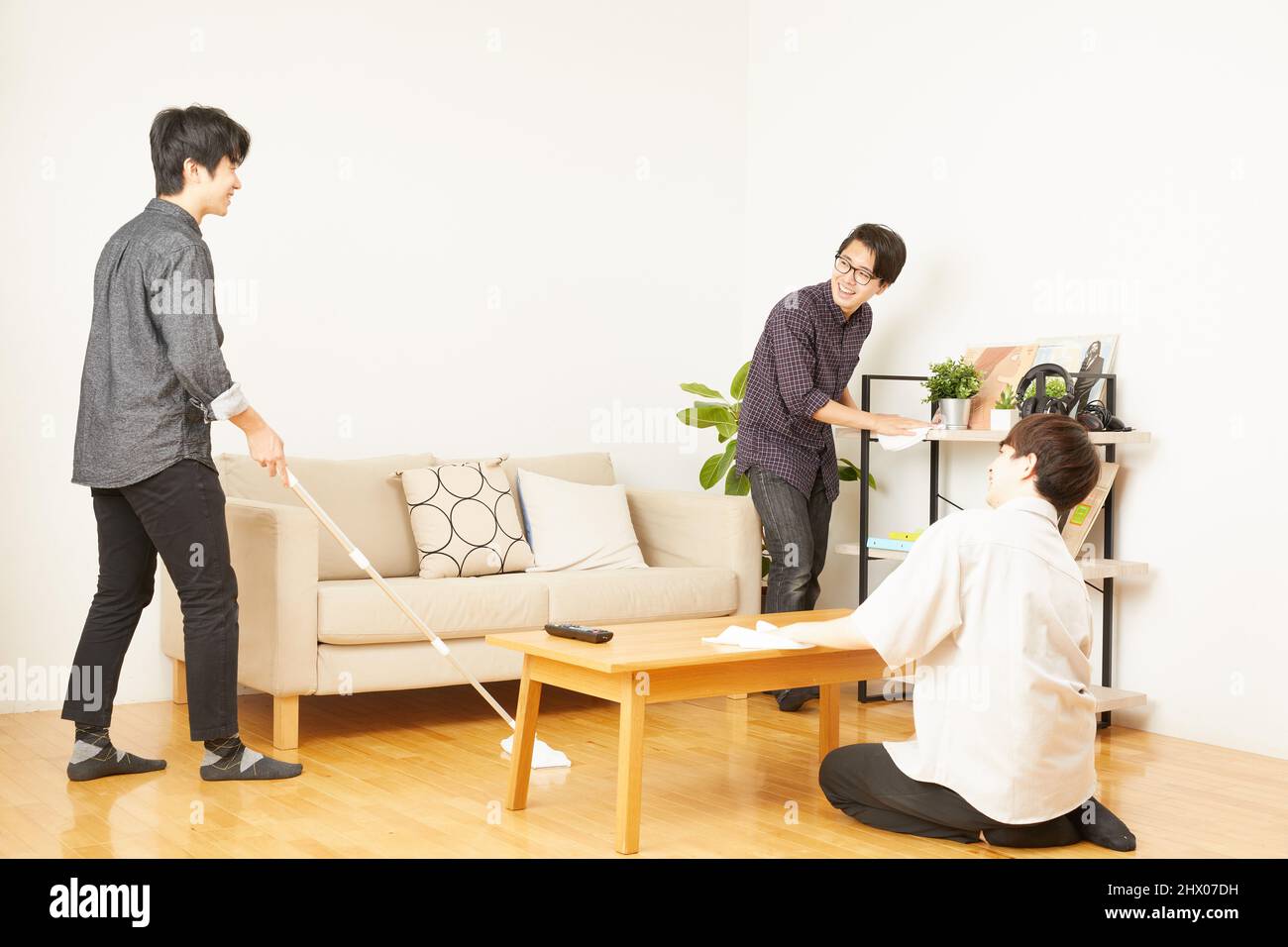 Japanese Men Cleaning The Room Stock Photo - Alamy