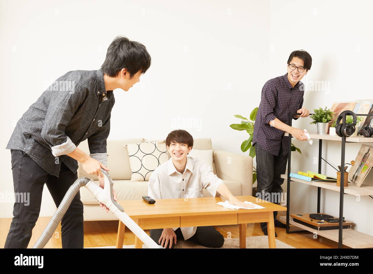 Japanese Men Cleaning The Room Stock Photo - Alamy