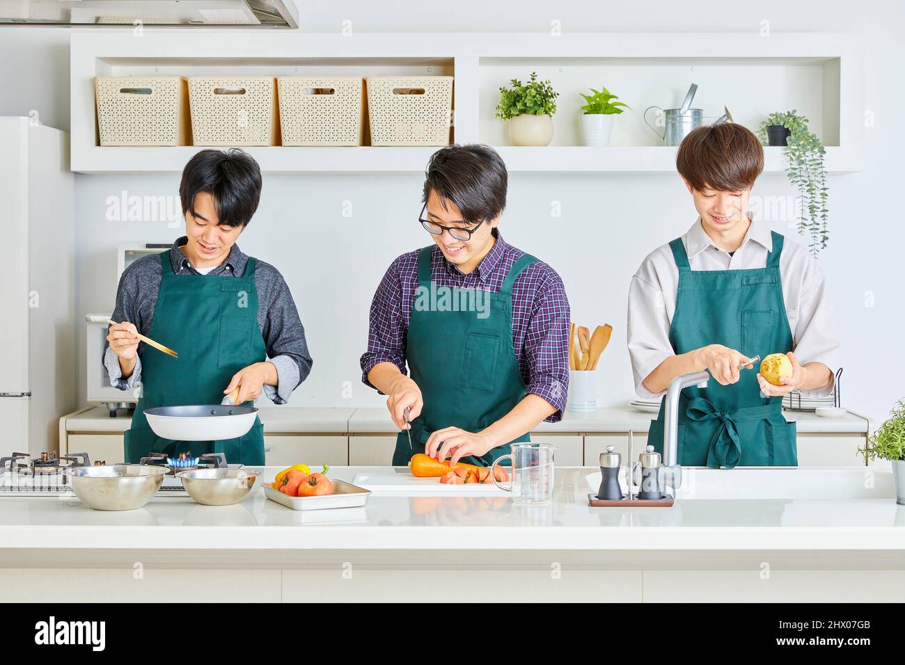 Japanese Men Cooking Stock Photo - Alamy