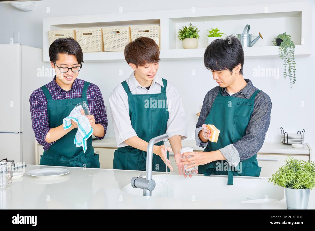 Japanese Men Cleaning The Room Stock Photo - Alamy