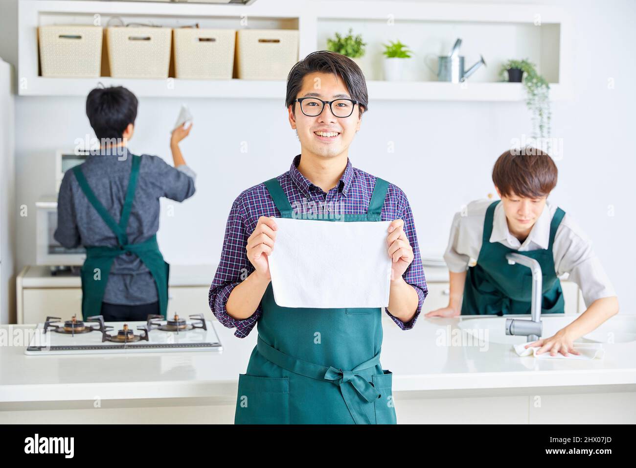Japanese Men Cleaning The Room Stock Photo - Alamy