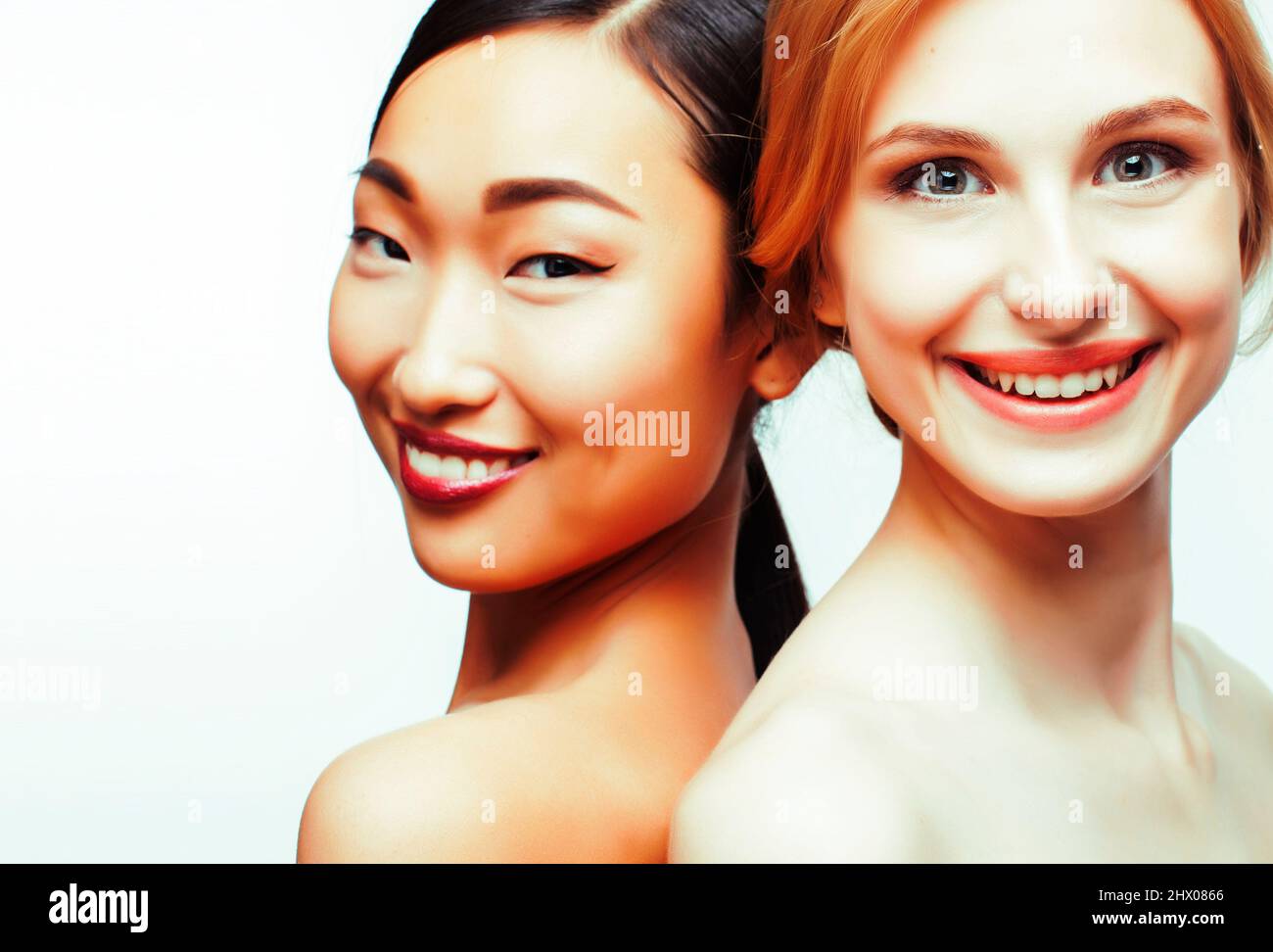 different nation woman: caucasian and asian together isolated on white ...