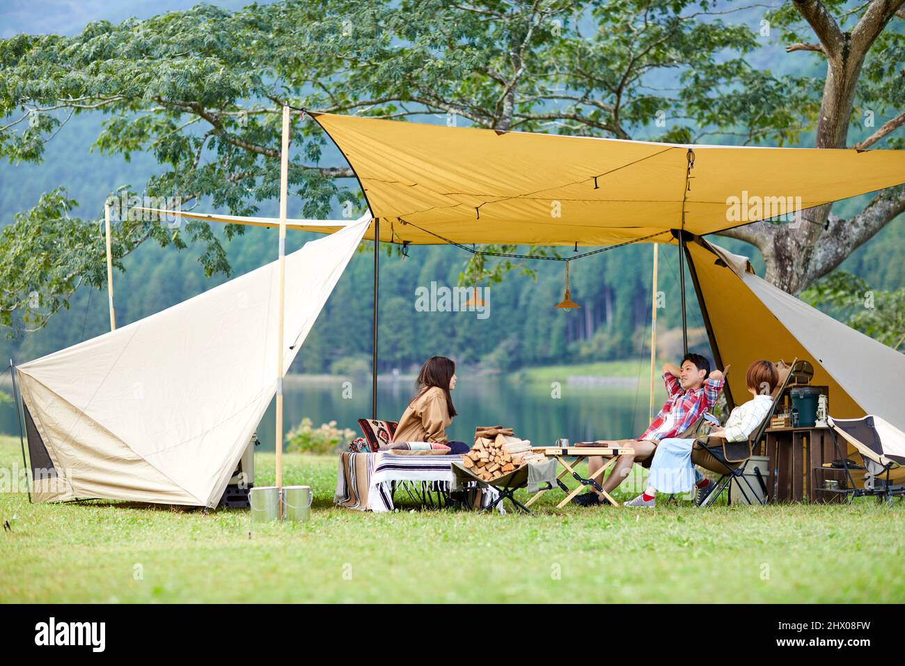 Young Japanese People Enjoying Camping Stock Photo - Alamy