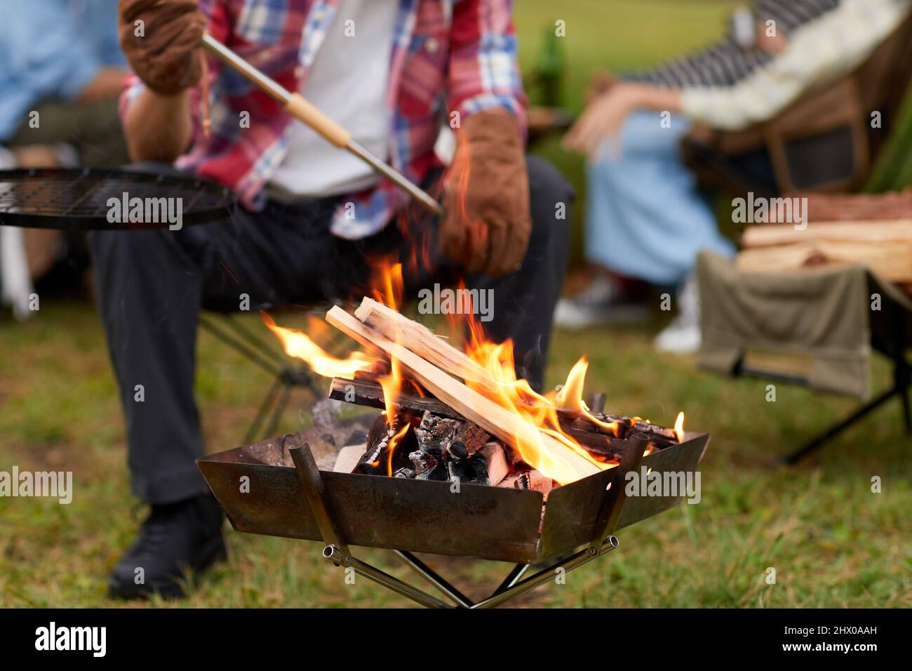 Japanese Men Making A Fire Stock Photo - Alamy