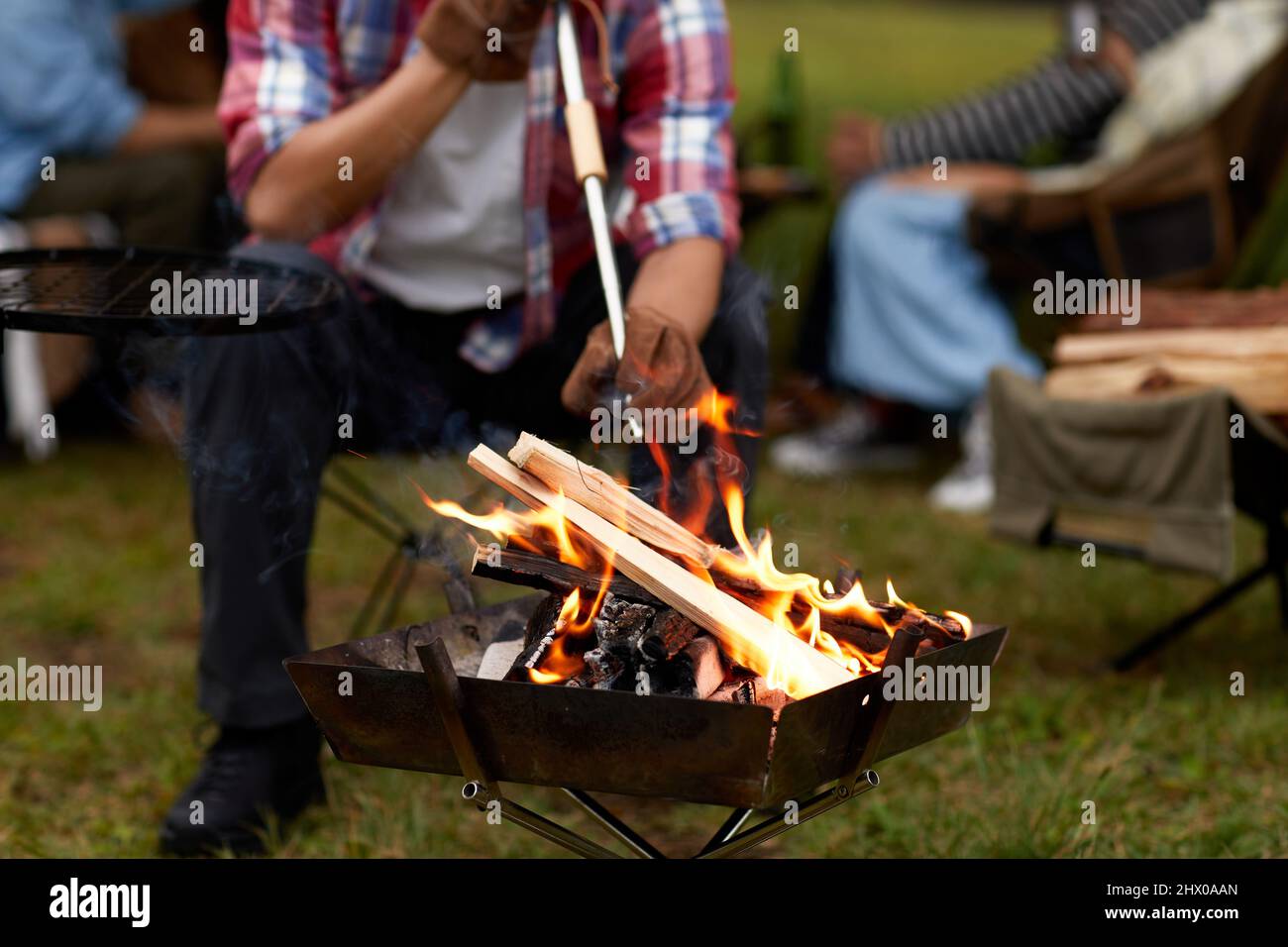 Japanese Men Making A Fire Stock Photo - Alamy