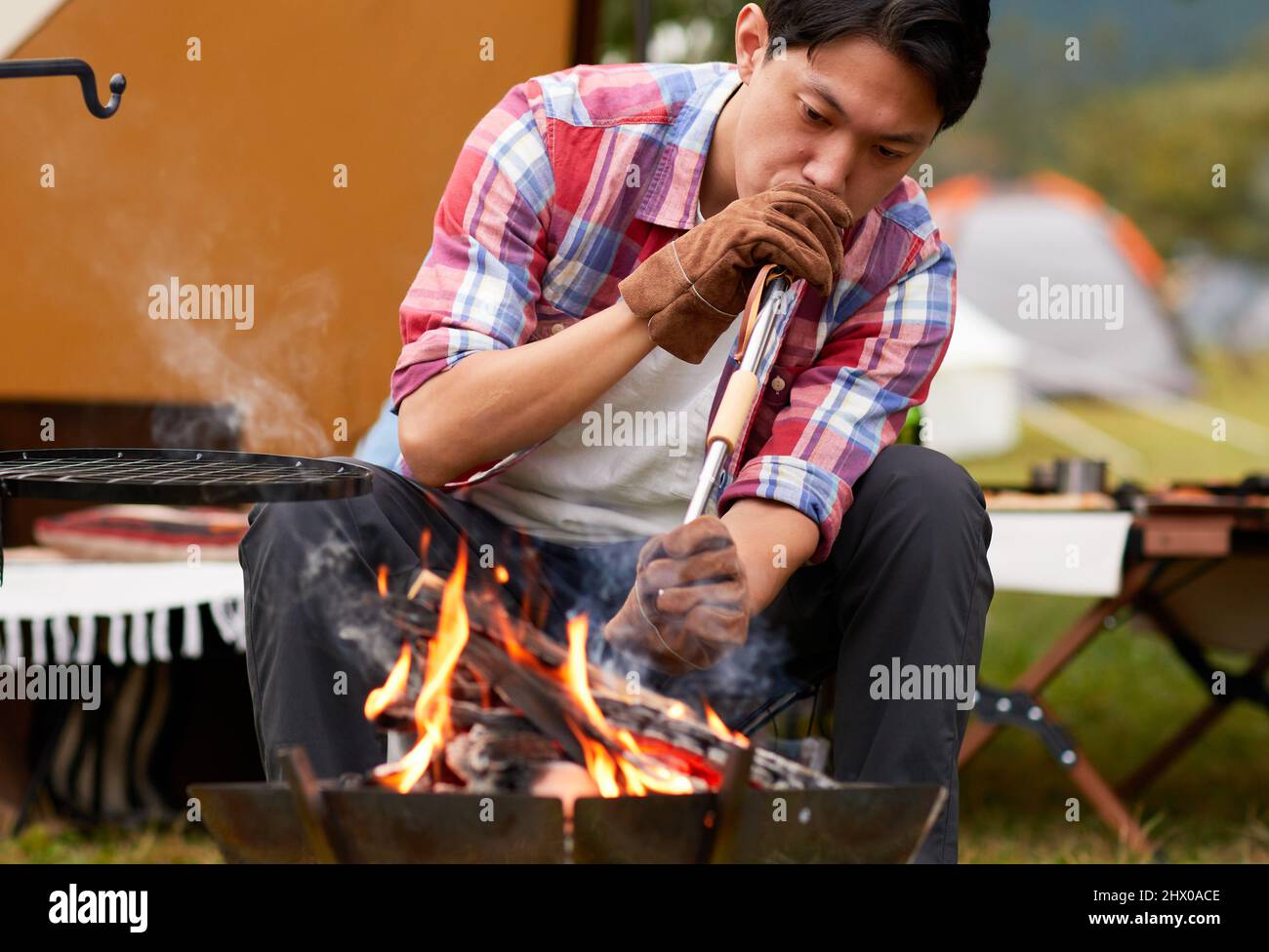 Person making bonfire hi-res stock photography and images - Alamy